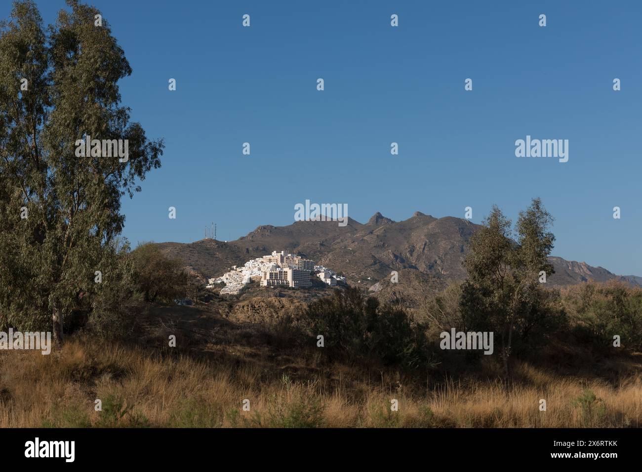 Old Mojacar on the hillside with white washed houses and narrow streets ...