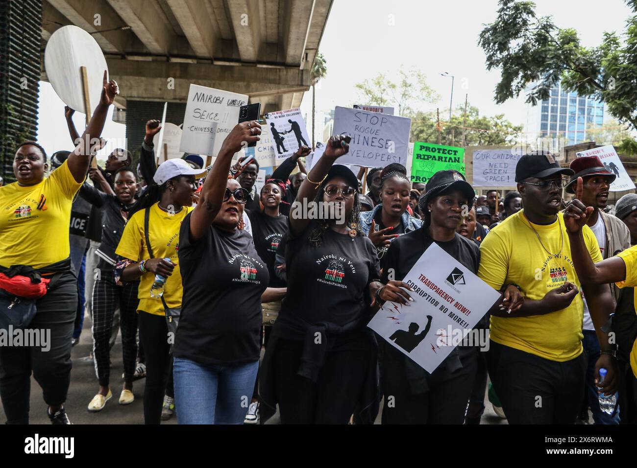 Nairobi, Kenya. 16th May, 2024. Residents of Nairobi hold placards and ...