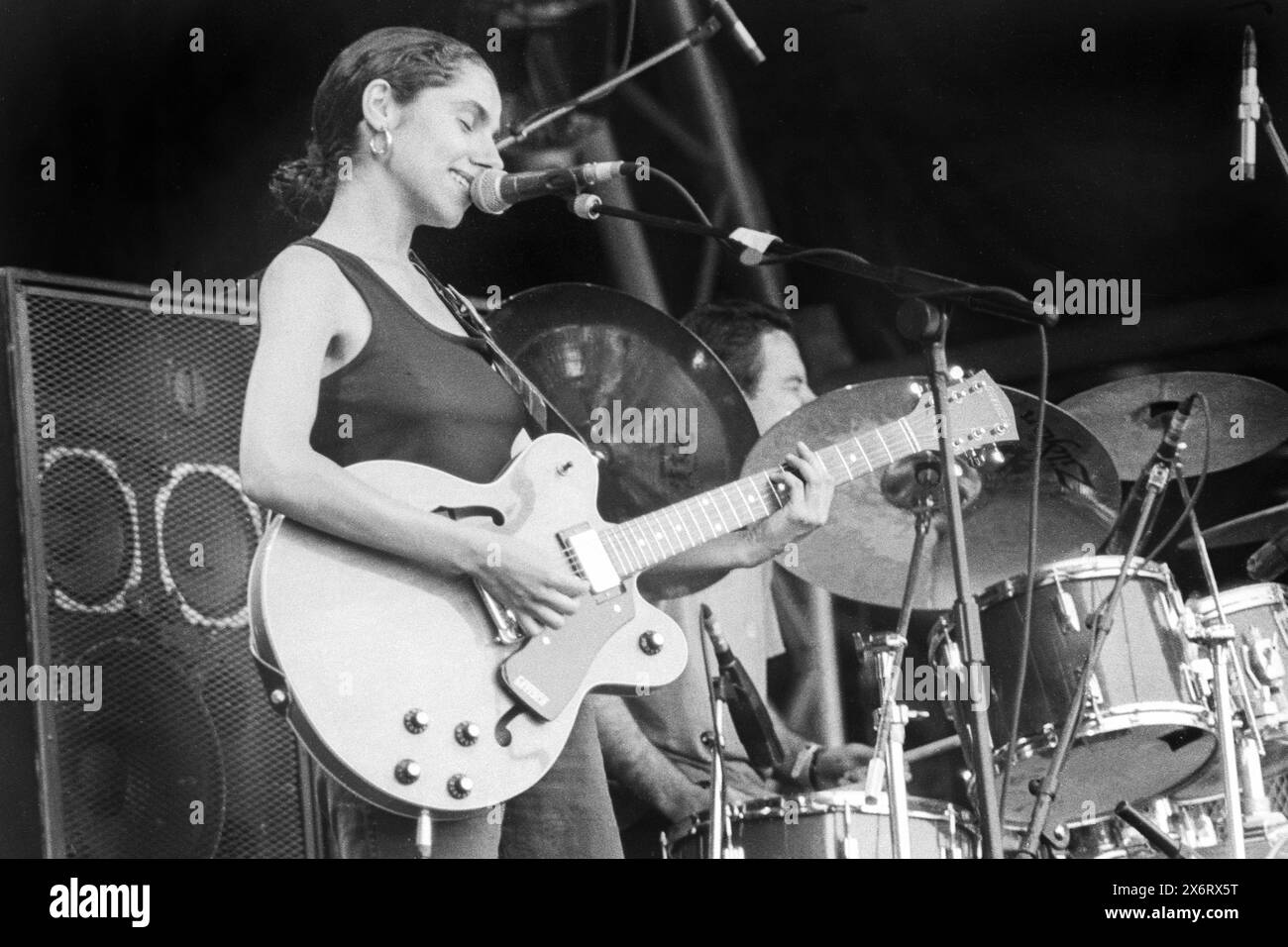 PJ HARVEY, FIRST GLASTONBURY FESTIVAL, 1992: PJ Harvey plays a Gretch ...