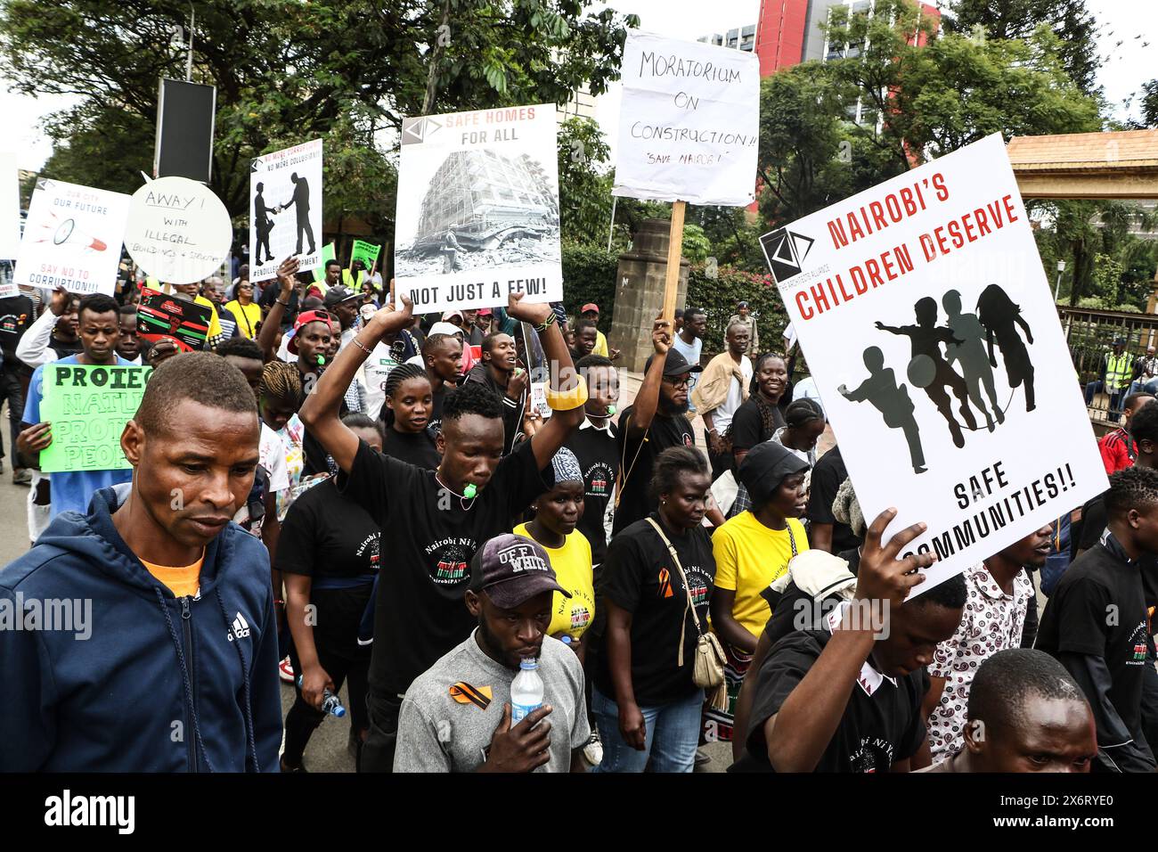 Nairobi, Kenya. 16th May, 2024. Residents of Nairobi hold placards and ...