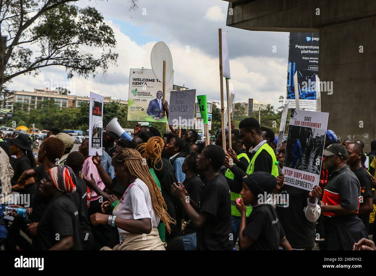 Nairobi, Kenya. 16th May, 2024. Residents of Nairobi hold placards and ...