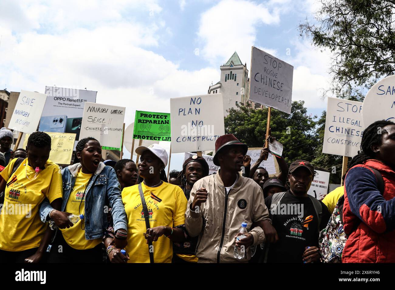 Nairobi, Kenya. 16th May, 2024. Residents of Nairobi hold placards and ...