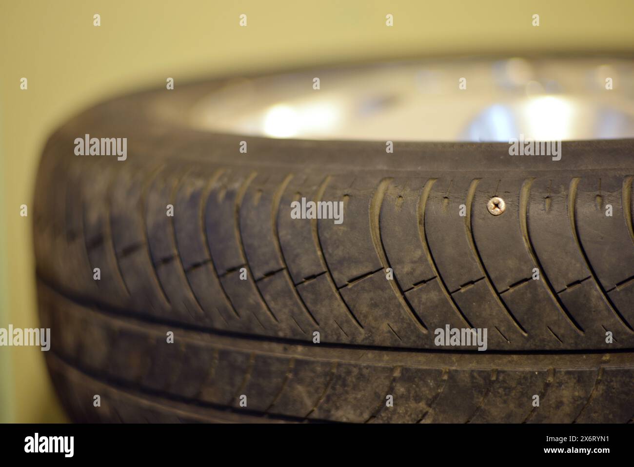 A car tire with no rubbertread with screw has a safety problem Stock ...