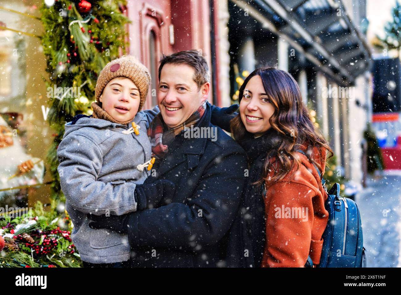 family with little son having fun together outdoor on frosty day Stock ...