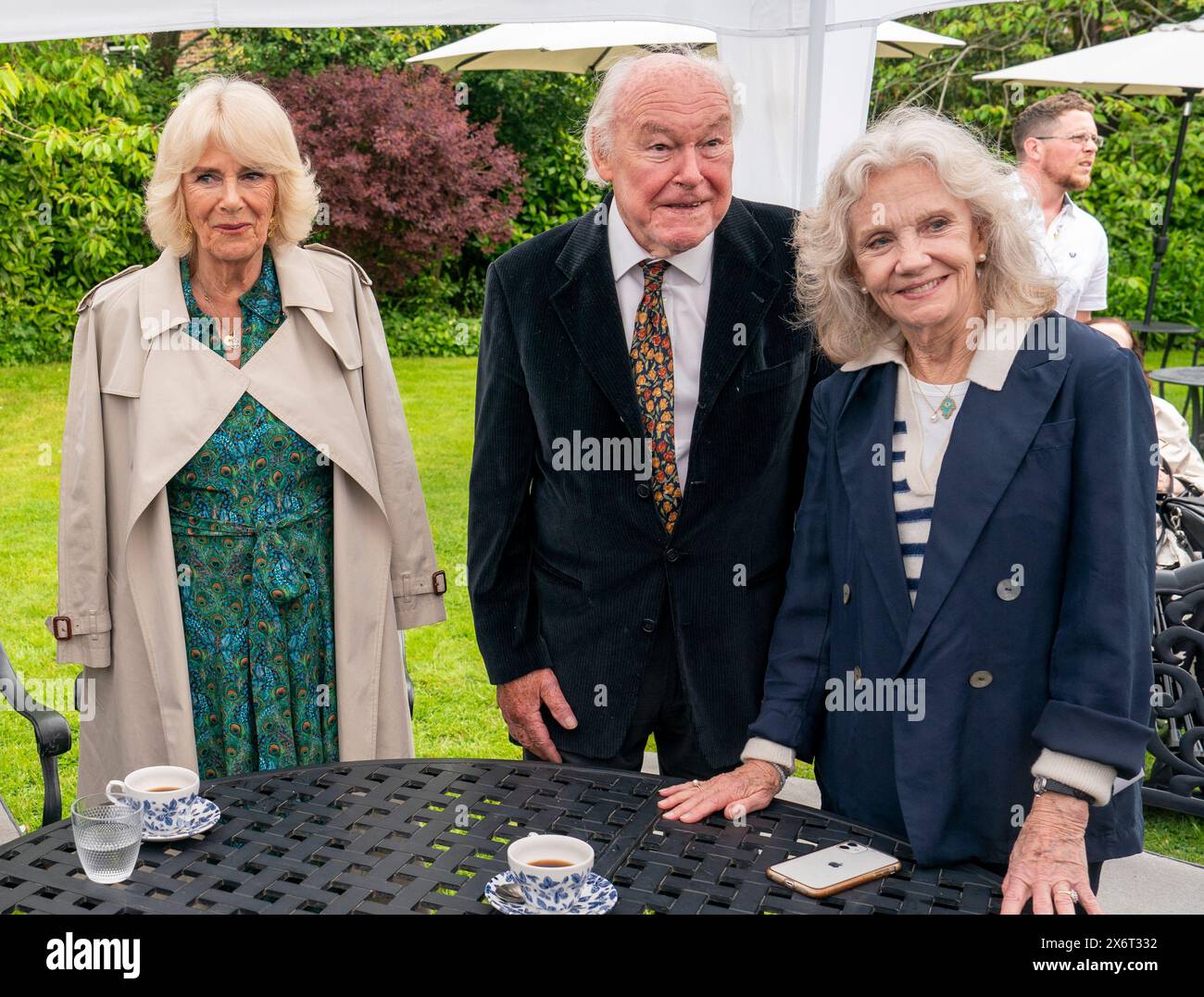 Queen Camilla (left) with actor Timothy West and Oscar winner Hayley ...