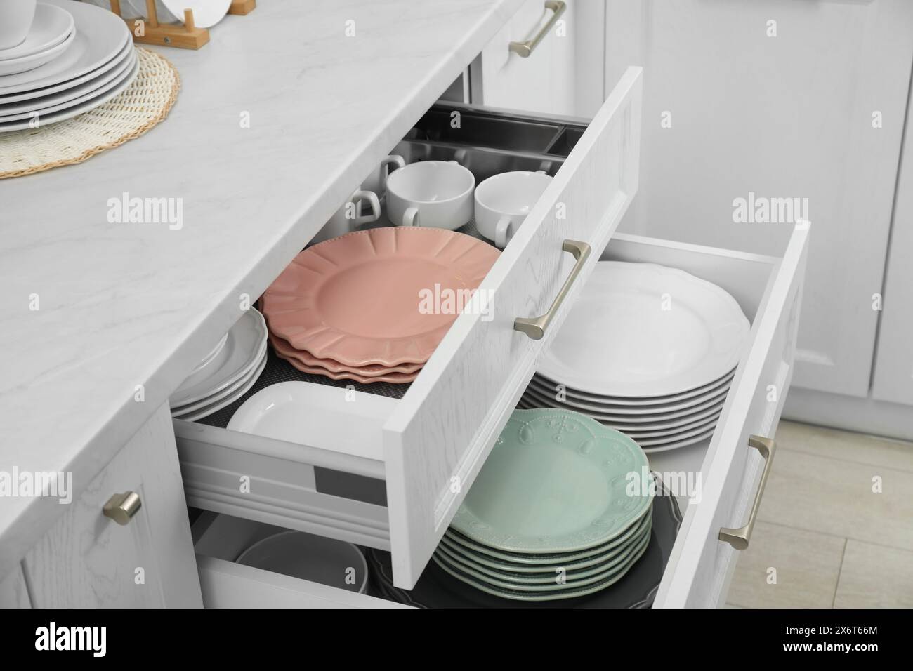 Stack plates bowls in restaurant hi-res stock photography and images ...