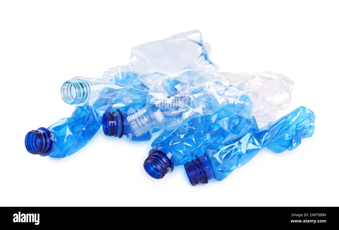 Crumpled disposable plastic bottles on white background Stock Photo - Alamy