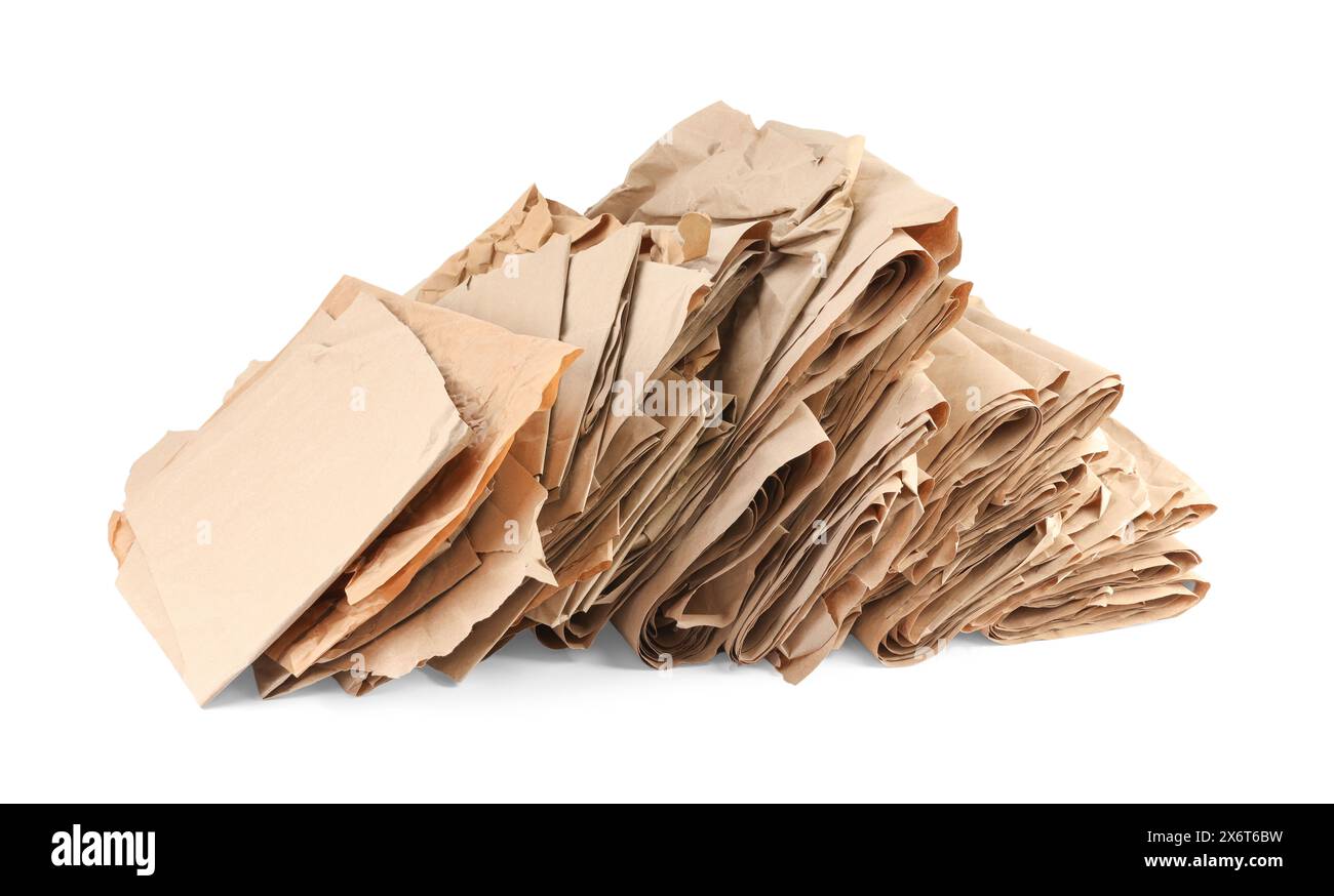 Pile of waste paper isolated on white Stock Photo - Alamy