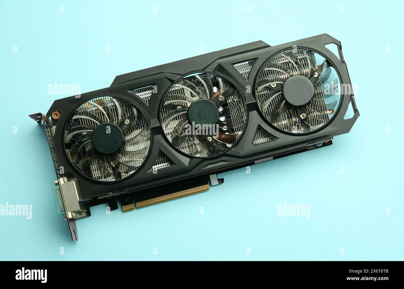 One graphics card on light blue background, top view. Space for text ...