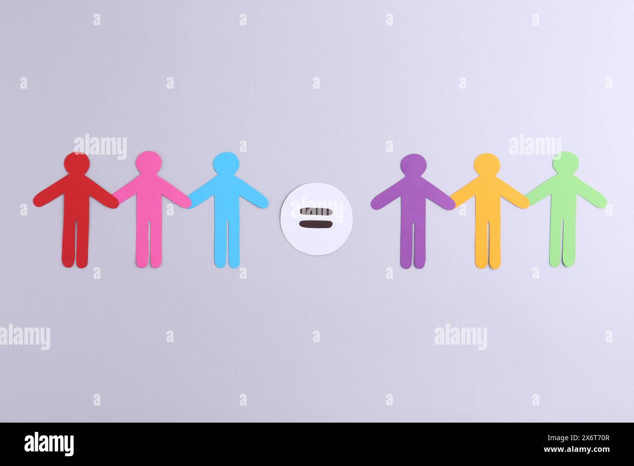 Paper human figures and equals sign on light background, flat lay Stock ...