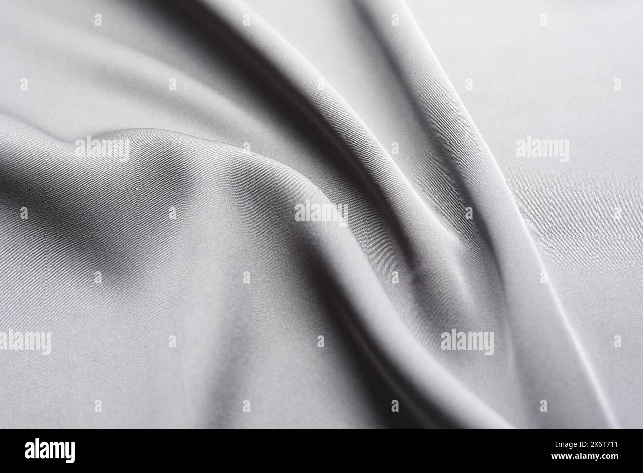 Texture of beautiful light grey silk fabric as background, closeup ...