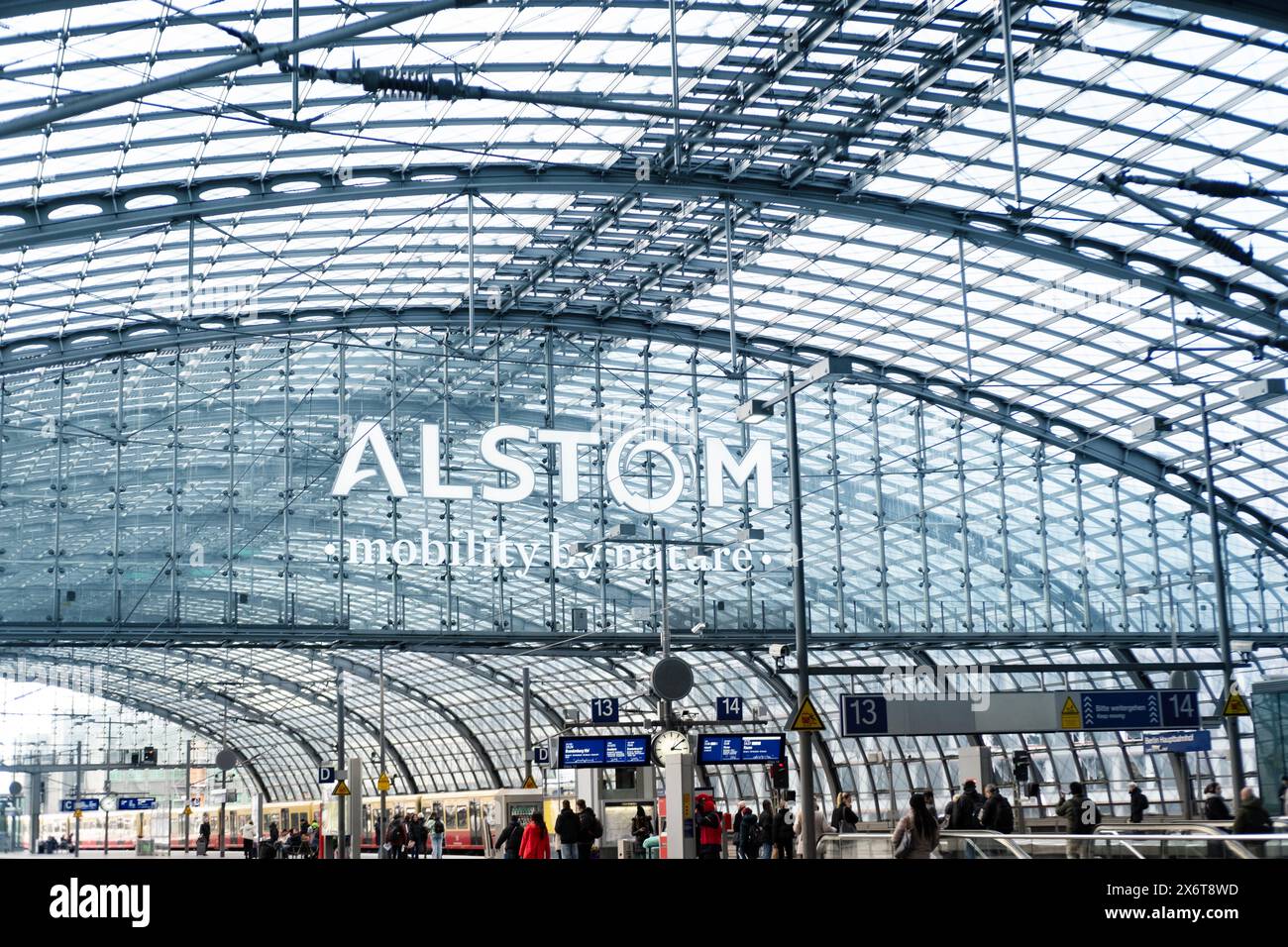 Alstom logo Company on arched metal vault at train station, French ...