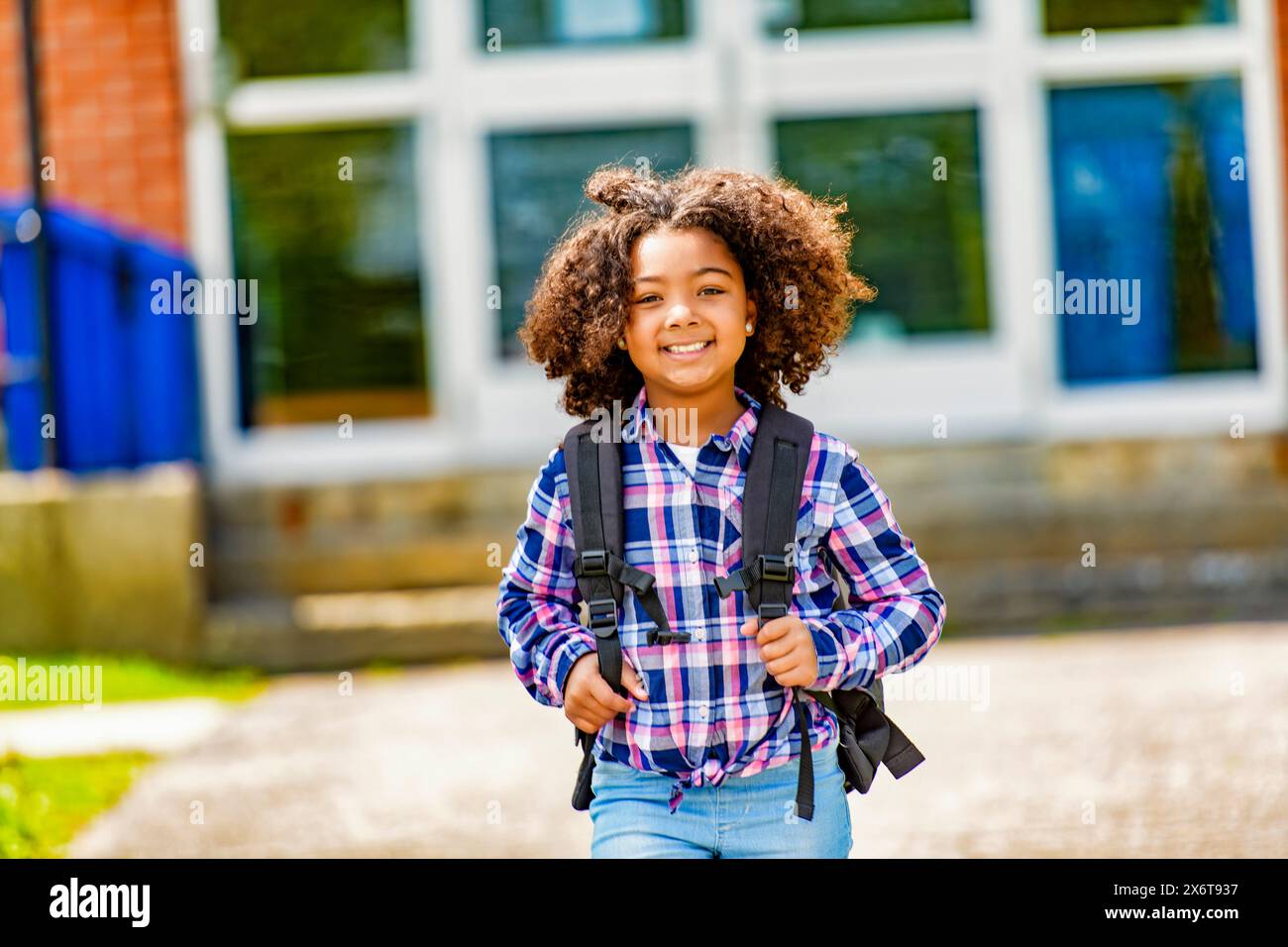 child going back to school with a backpack Stock Photo - Alamy