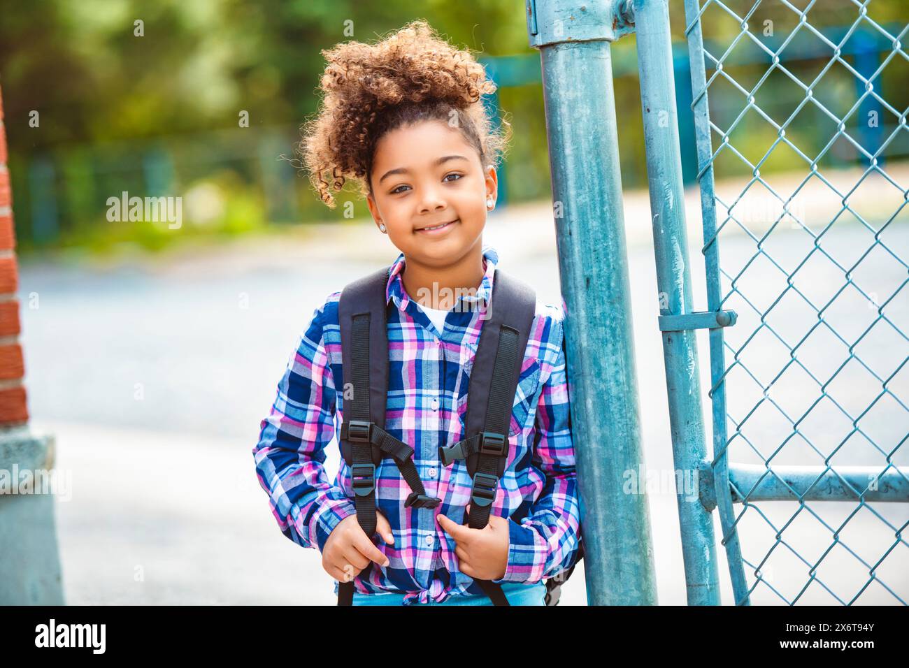 child going back to school with a backpack Stock Photo - Alamy