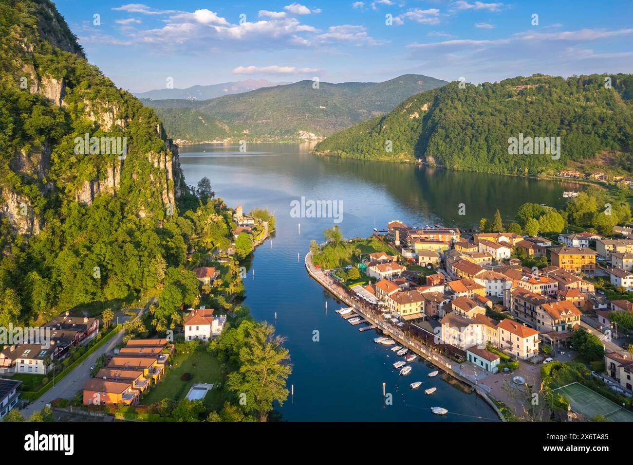 Aerial view of the small italian village of Lavena with its strait at ...