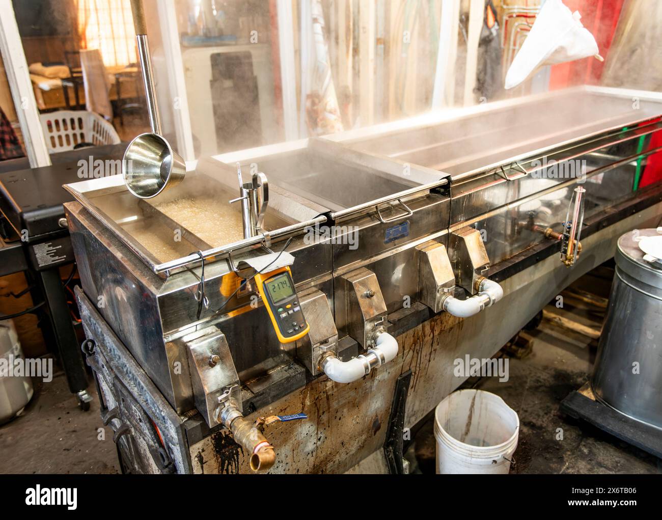 boiling maple syrup sap boiling pans with steam Stock Photo - Alamy