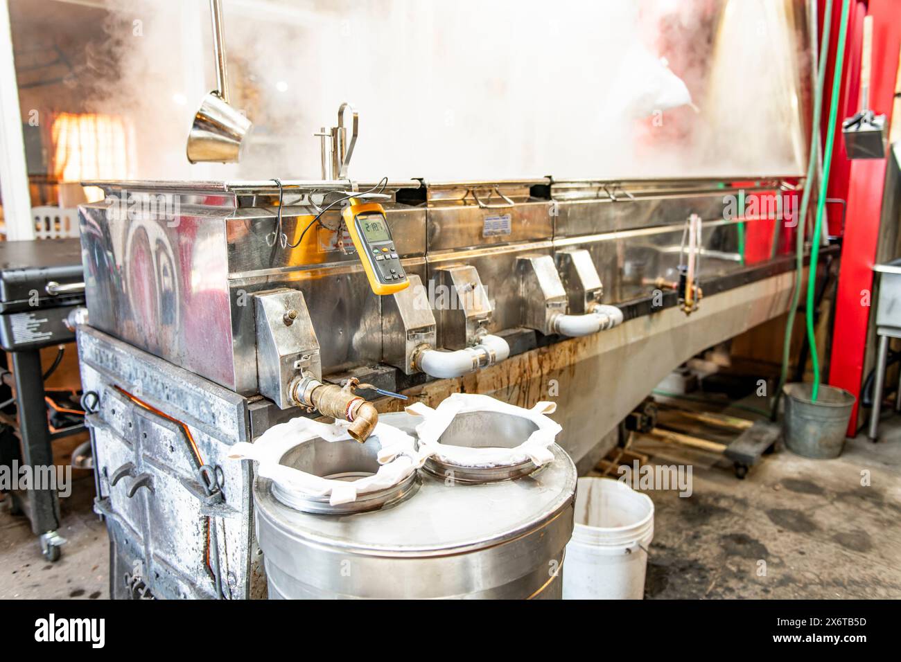 boiling maple syrup sap boiling pans with steam Stock Photo - Alamy