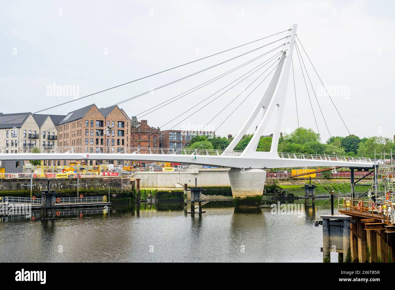 Construction of the pedestrian swing bridge across the River Clyde ...