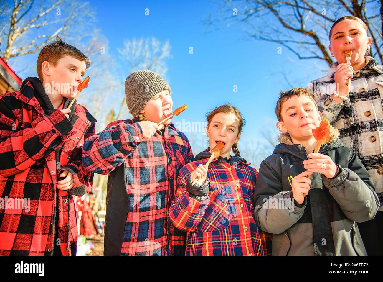 Child tasting maple syrup hi-res stock photography and images - Alamy