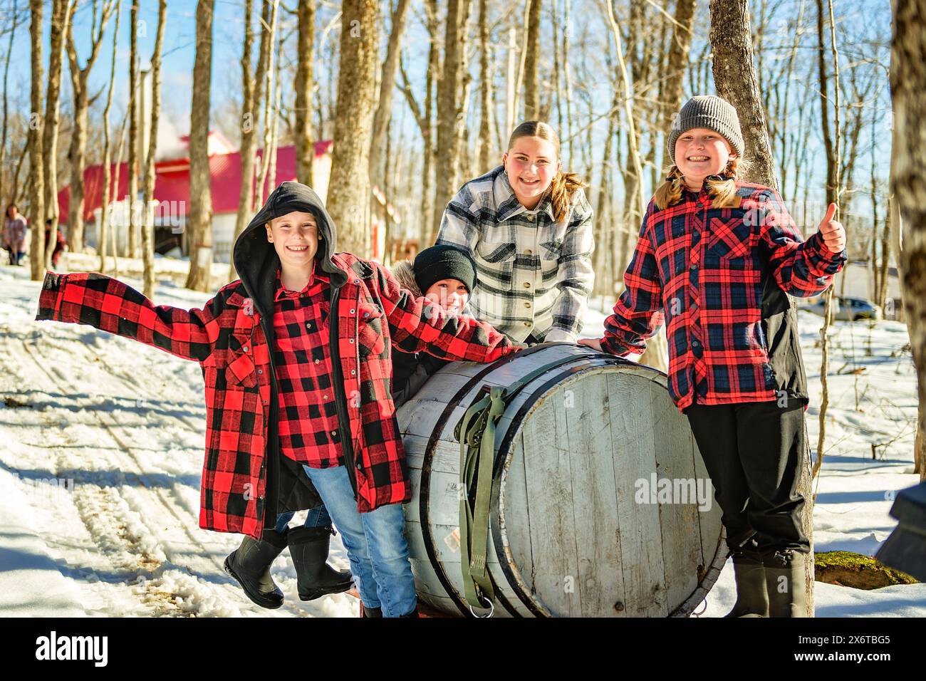 Photo showing children having great time at maple shack Stock Photo - Alamy