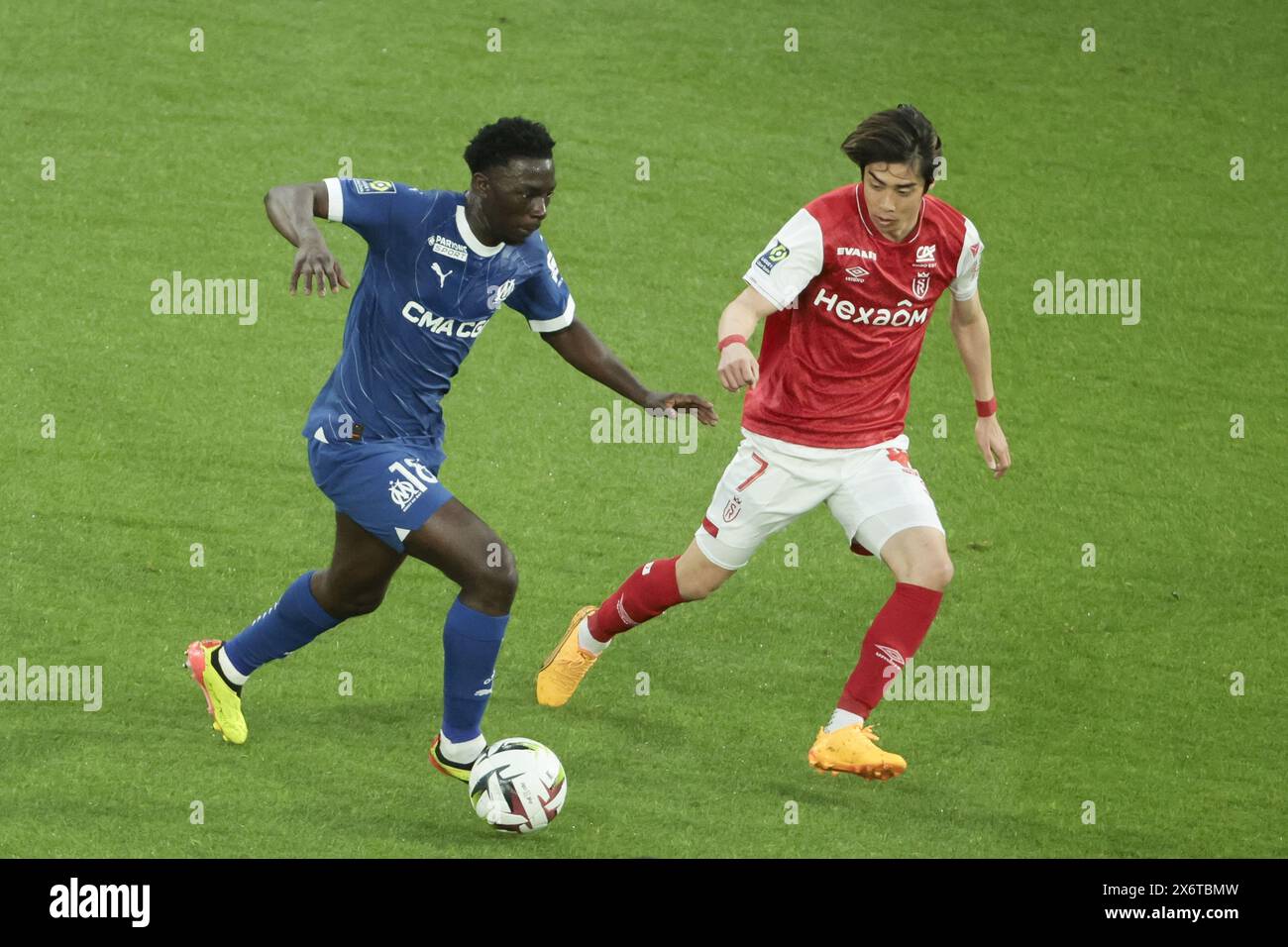Bamo Meite of Marseille, Junya Ito of Reims during the French ...