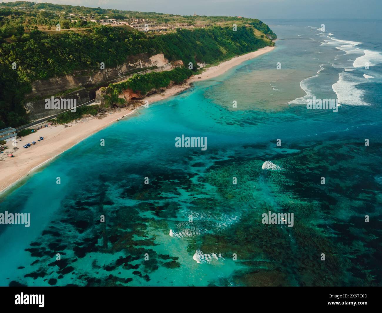 Aerial view of Pandawa beach with turquoise ocean and waves in Bali ...