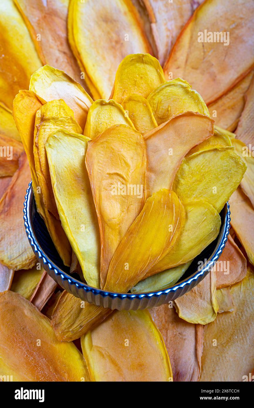 Close-Up of Dried Mango Slices in a Bowl Stock Photo - Alamy