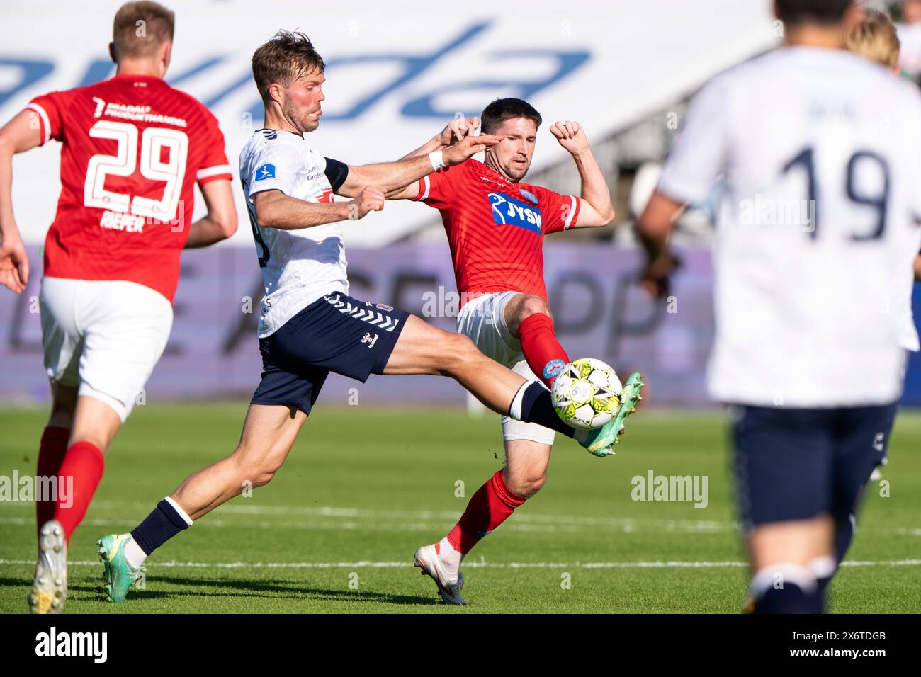 AGF's Patrick Mortensen in battle with Silkeborg's Mark Brink during ...