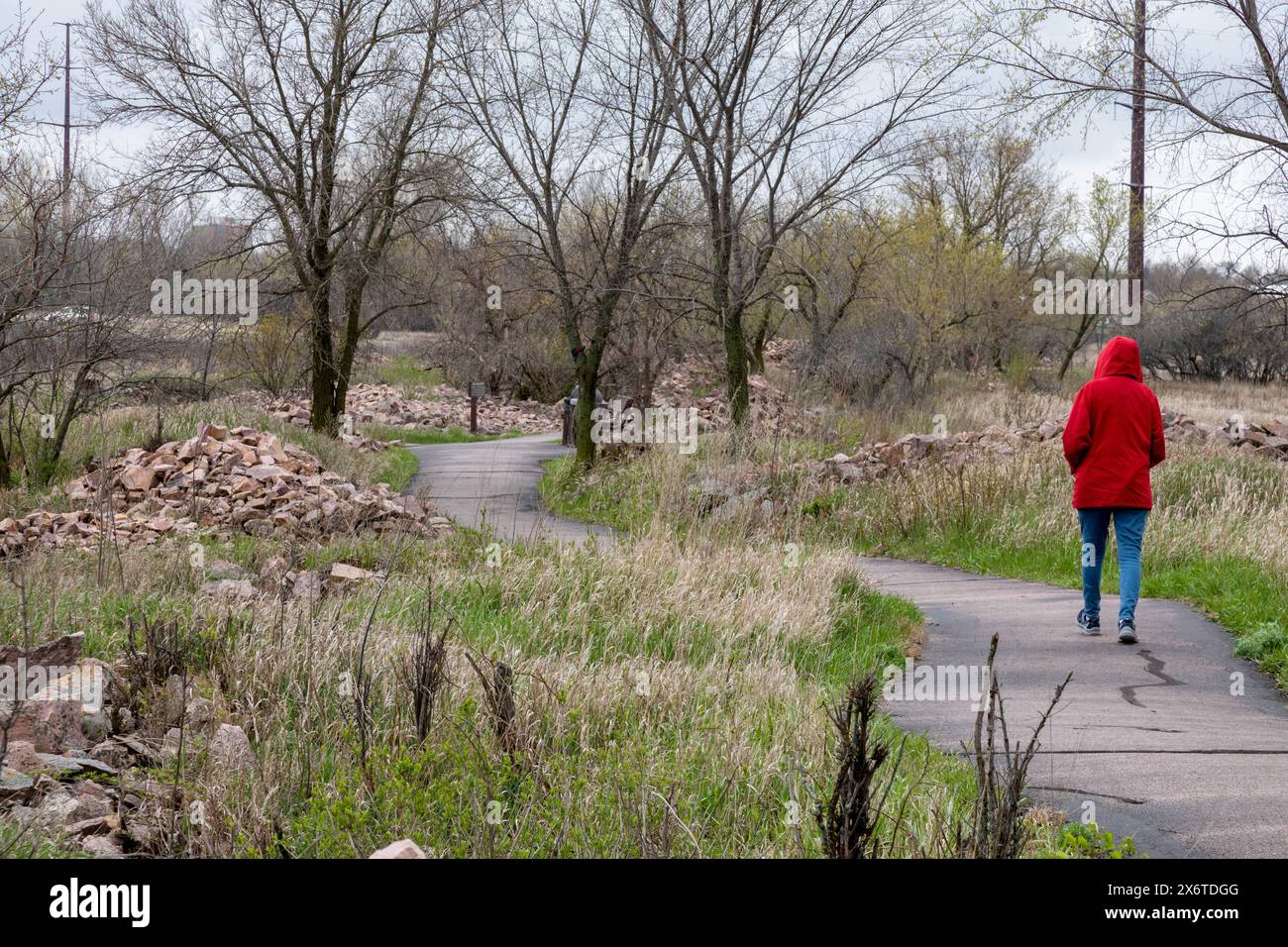 Pipestone, Minnesota - A tourist walks along a path by active quarries ...