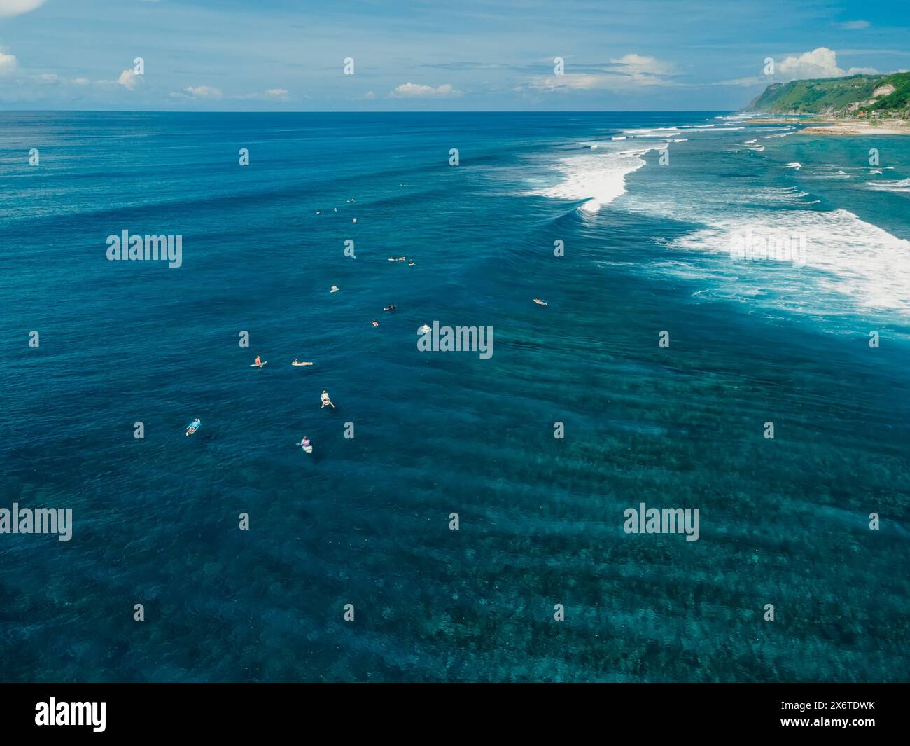 Aerial view with surfers on surf spot. Perfect waves with surfers in ...