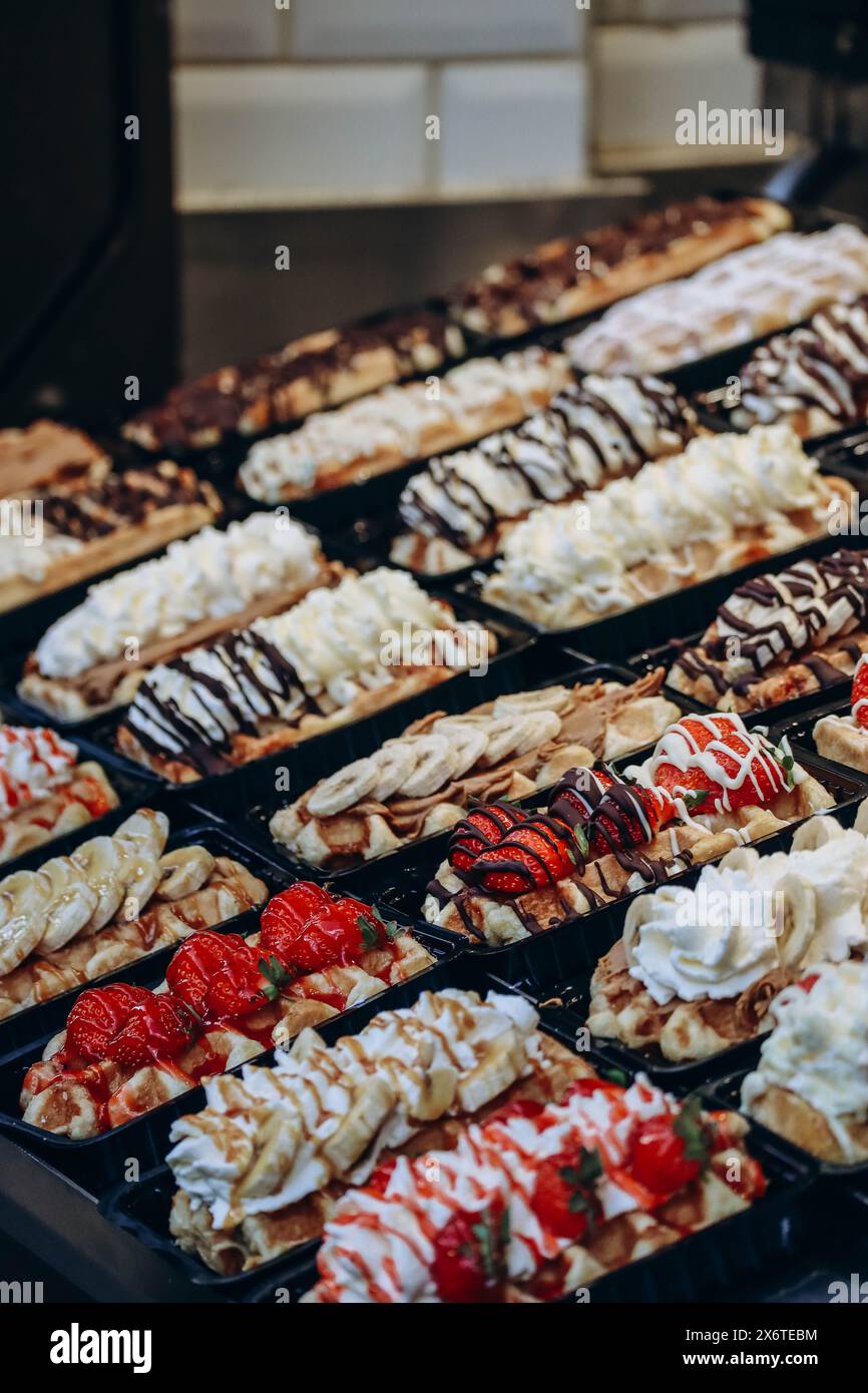 Traditional Belgian waffles with different toppings Stock Photo - Alamy
