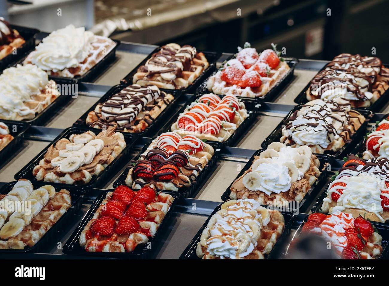 Traditional Belgian waffles with different toppings Stock Photo - Alamy