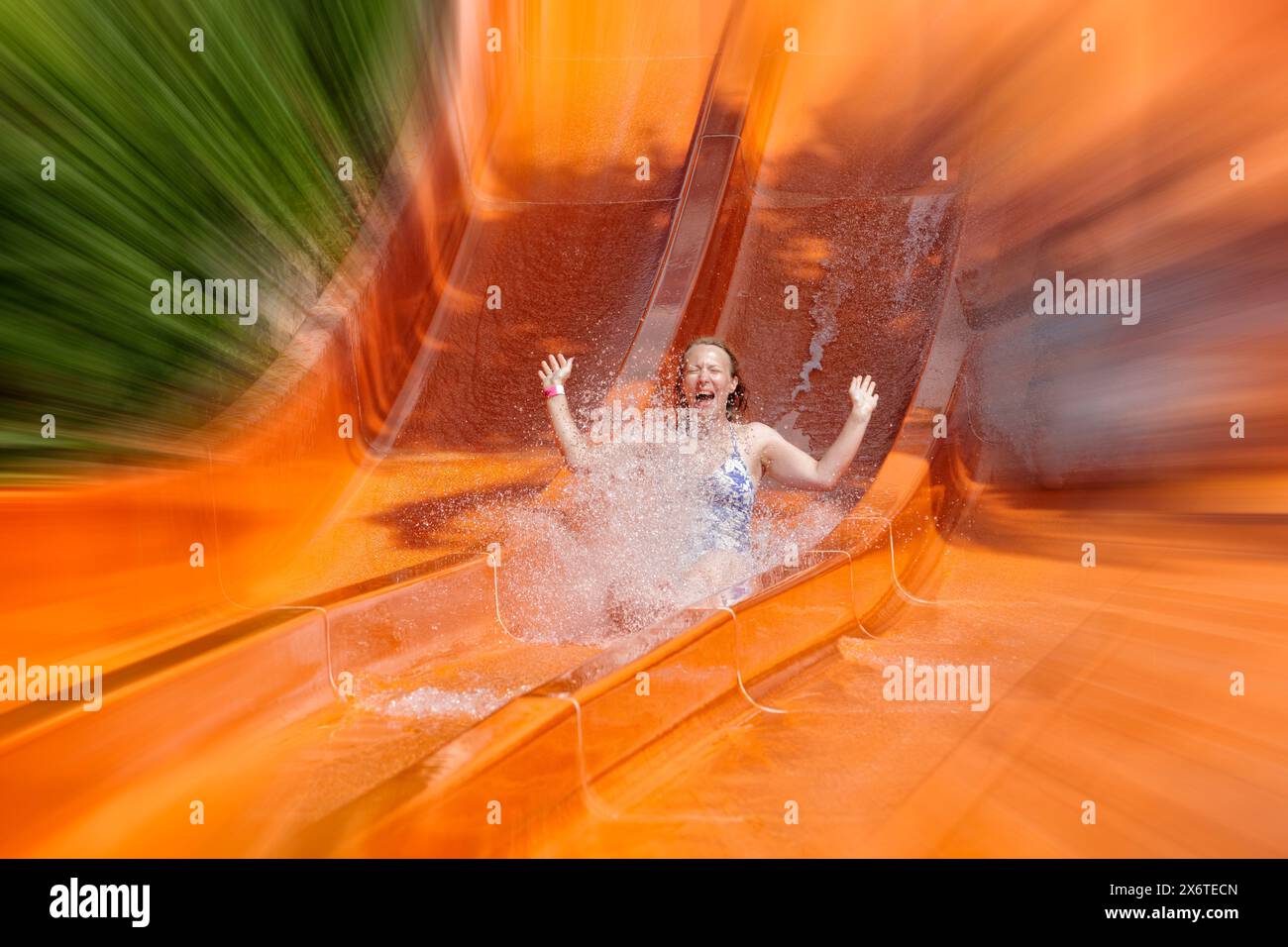 Radial blur of a woman screaming on a waterslide in the Acqua Plus ...