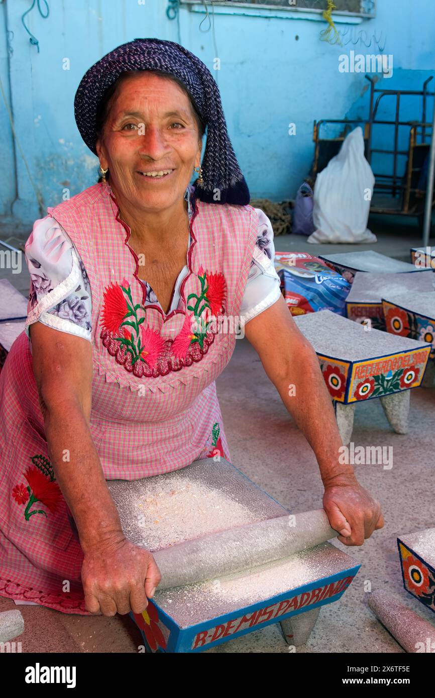 Tlacolula; Oaxaca; Mexico. Zapotec Indian Woman Grinding Corn (Maize ...