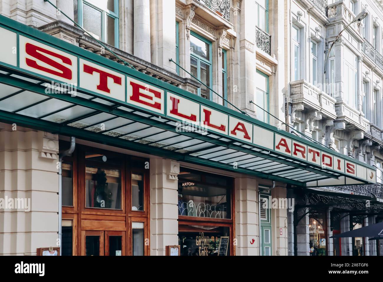 Brussels, Belgium - October 21, 2023: Beautiful vintage "Stella Artois" sign on a bar in the ...