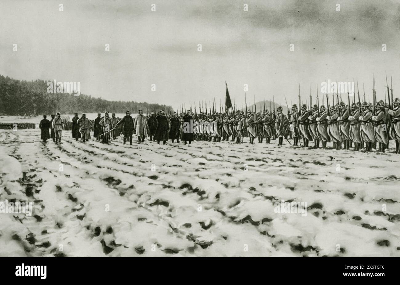 An illustration depicts General Joffre reviewing his soldiers on a snow ...