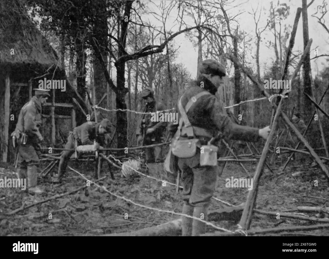 British soldiers are shown placing barbed wire in their newly won ...