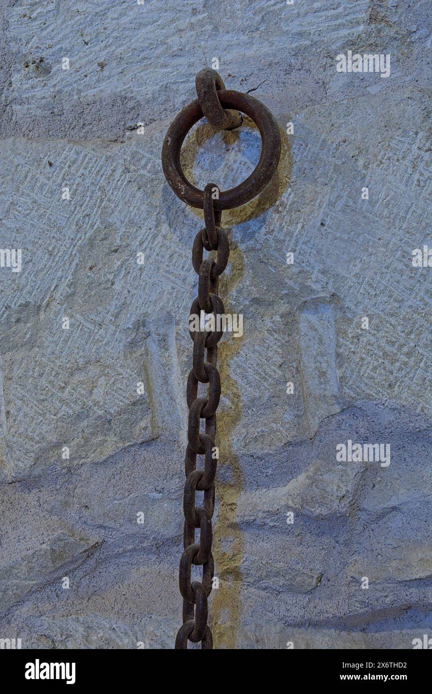 prisoner chains mounted on stone wall of guard shack at Fort Stockton ...