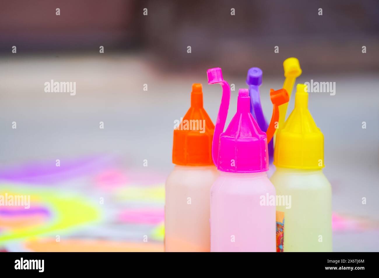 bottle of color powder used to make a rangoli a traditional art made on ...