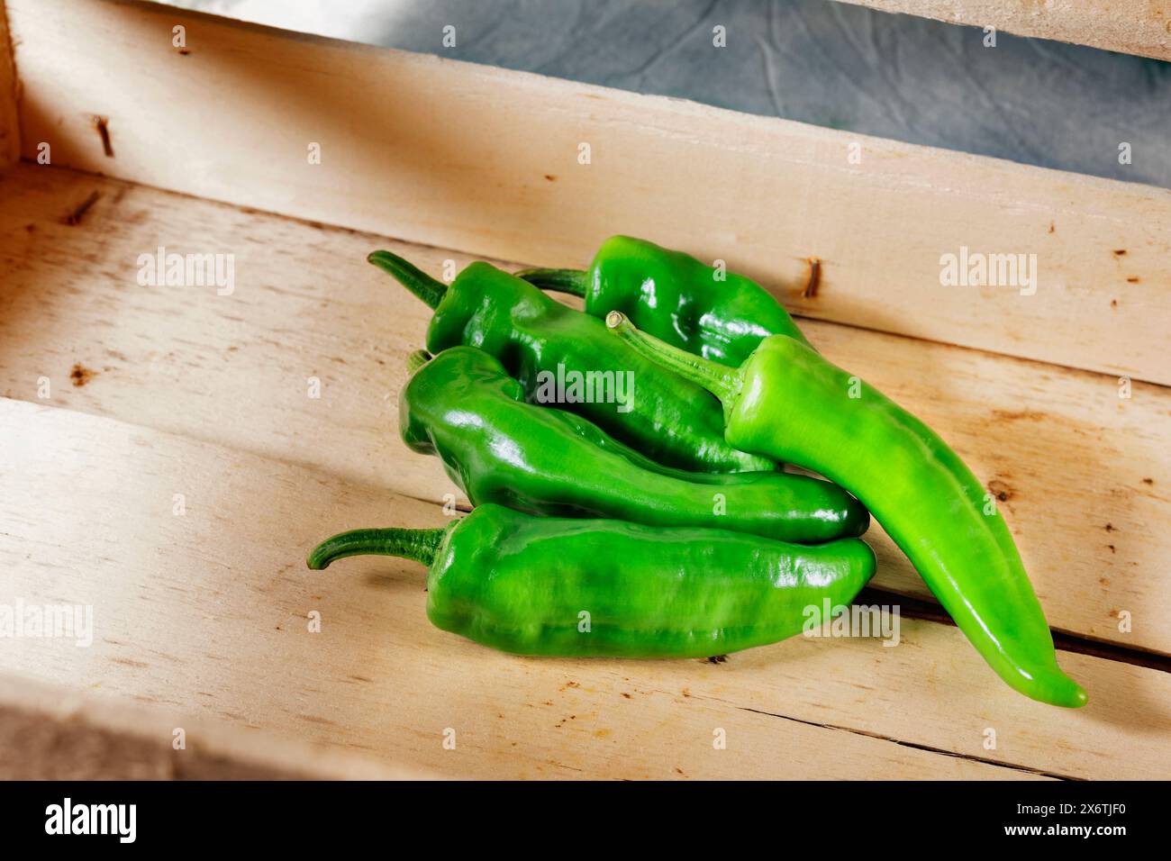 Sweet green chili peppers also known as the golden Greek pepper or ...