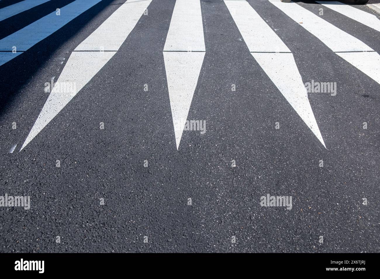 raised pedestrian crossing painted on the asphalt Stock Photo - Alamy