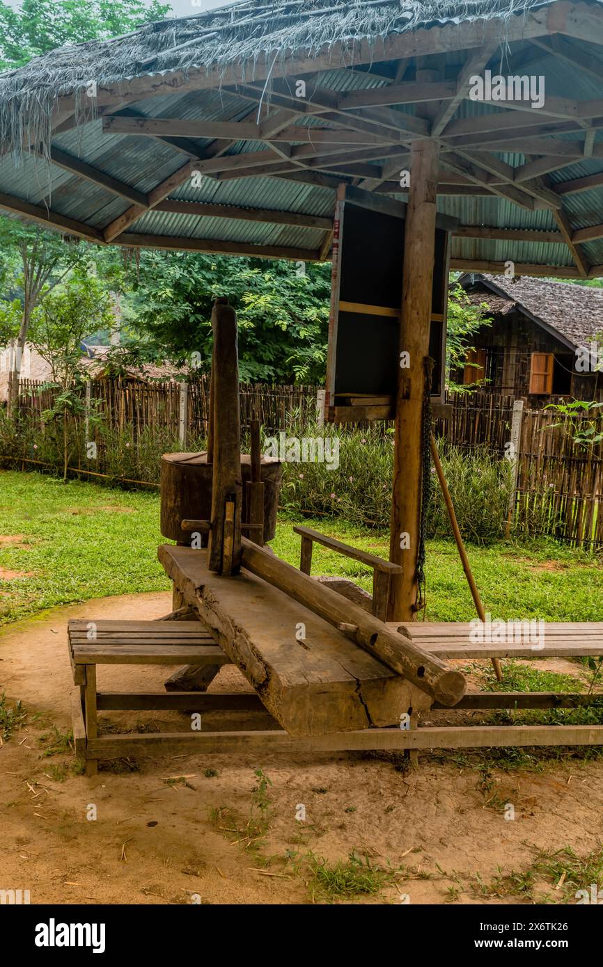 Traditional sesame seed mill and oil press in Thai cultural village in ...