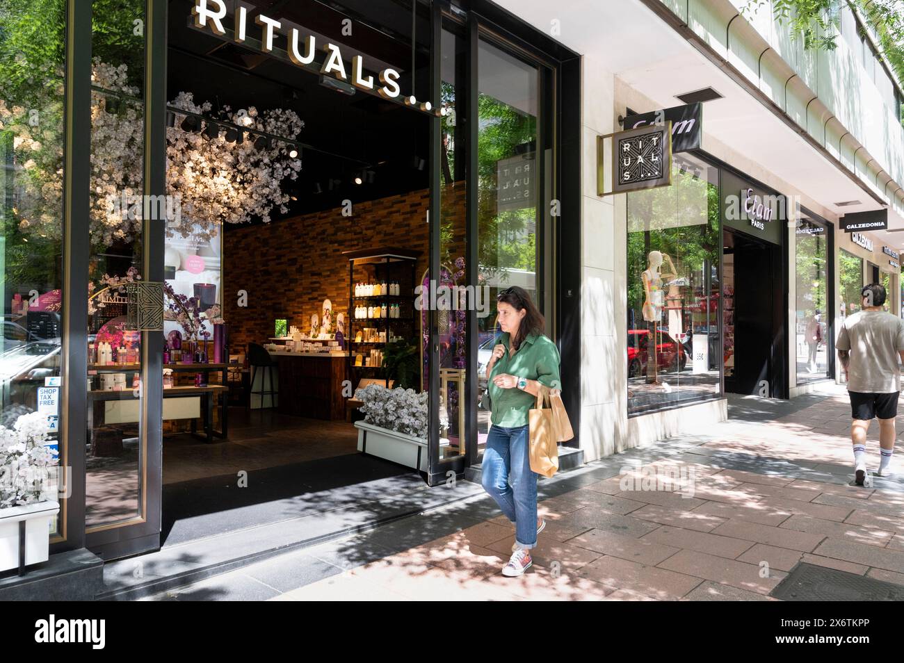 A pedestrian walks past the Dutch cosmetics brand Rituals store in ...