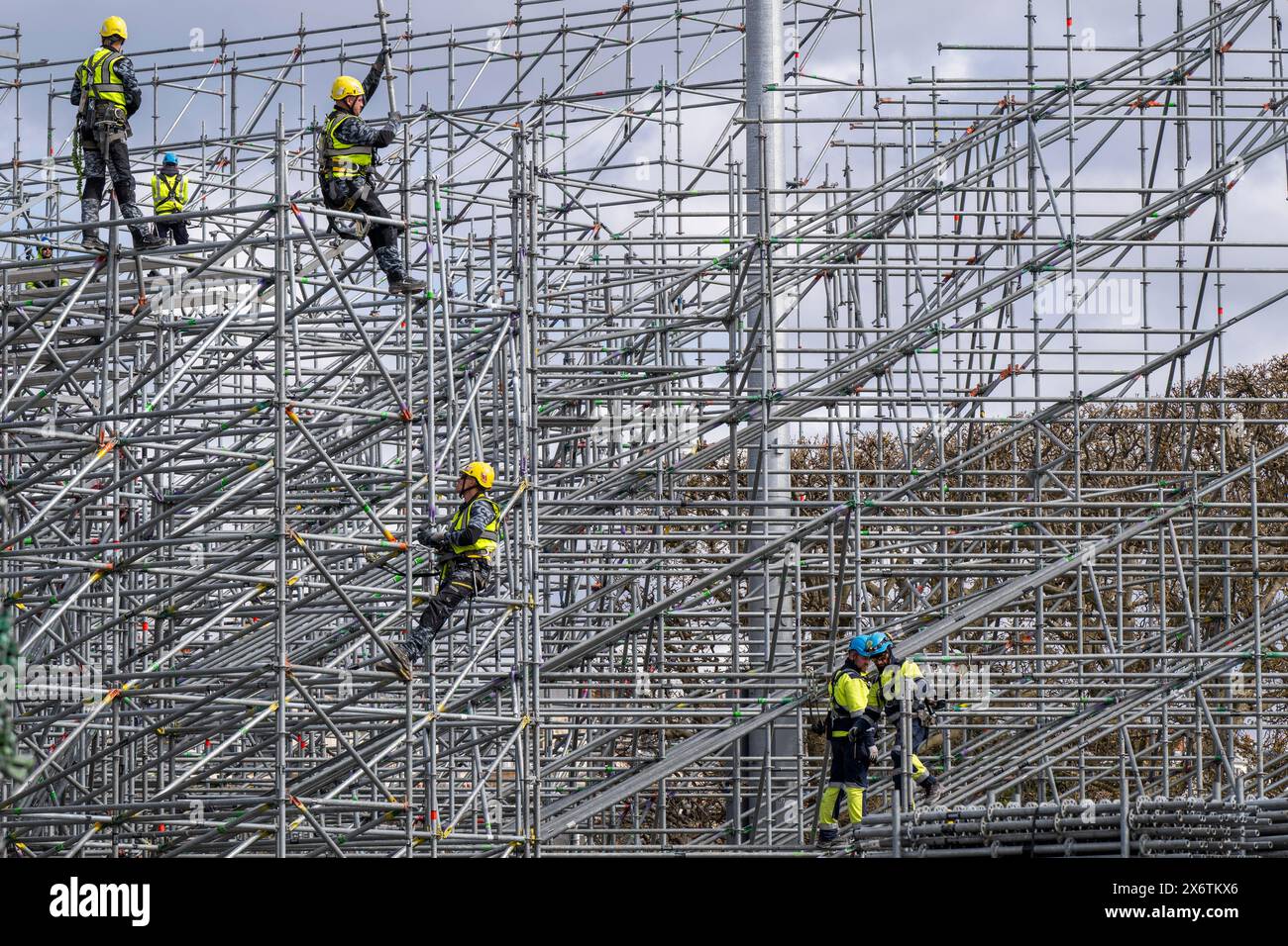 Construction workers on scaffolding, preparations for the Olympic Games ...
