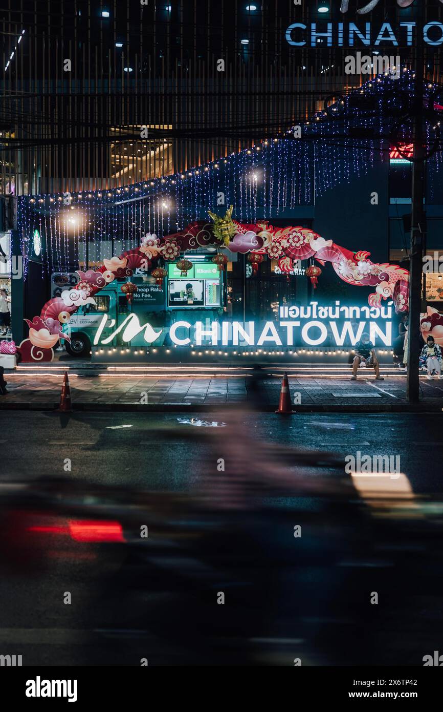 Illuminated entrance sign to Chinatown in Bagkok Thailand at night. In ...