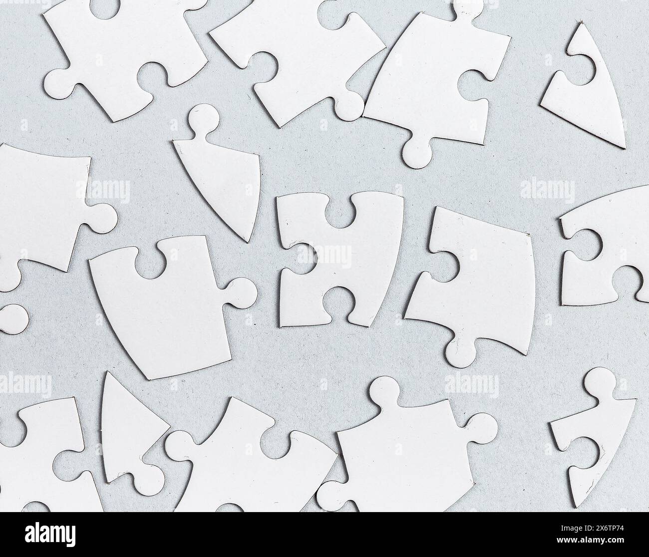 Jigsaw puzzle pieces connecting on abstract pattern background ...