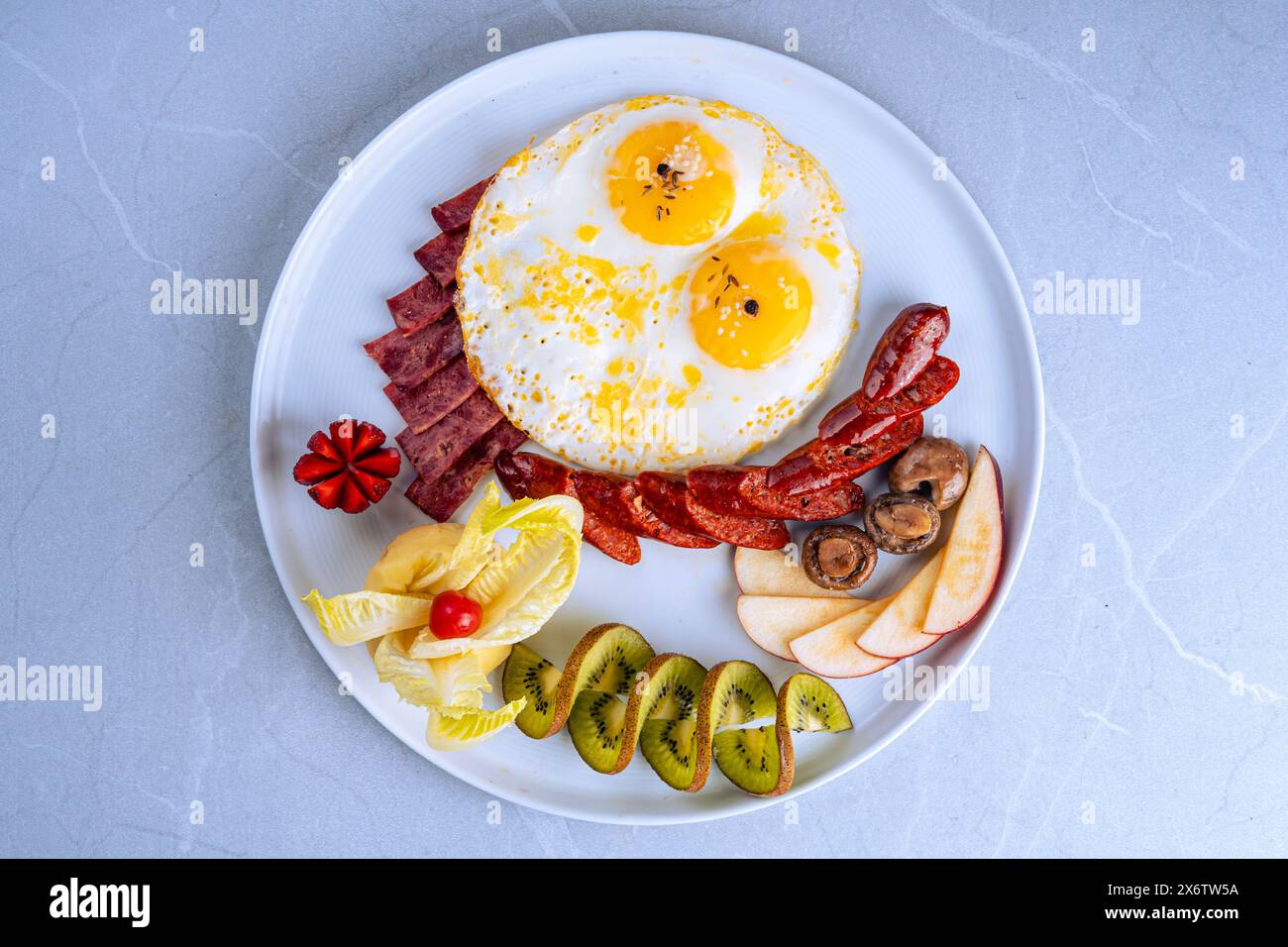 Healthy Breakfast Plate with Fried Eggs and Fresh Fruits Stock Photo ...