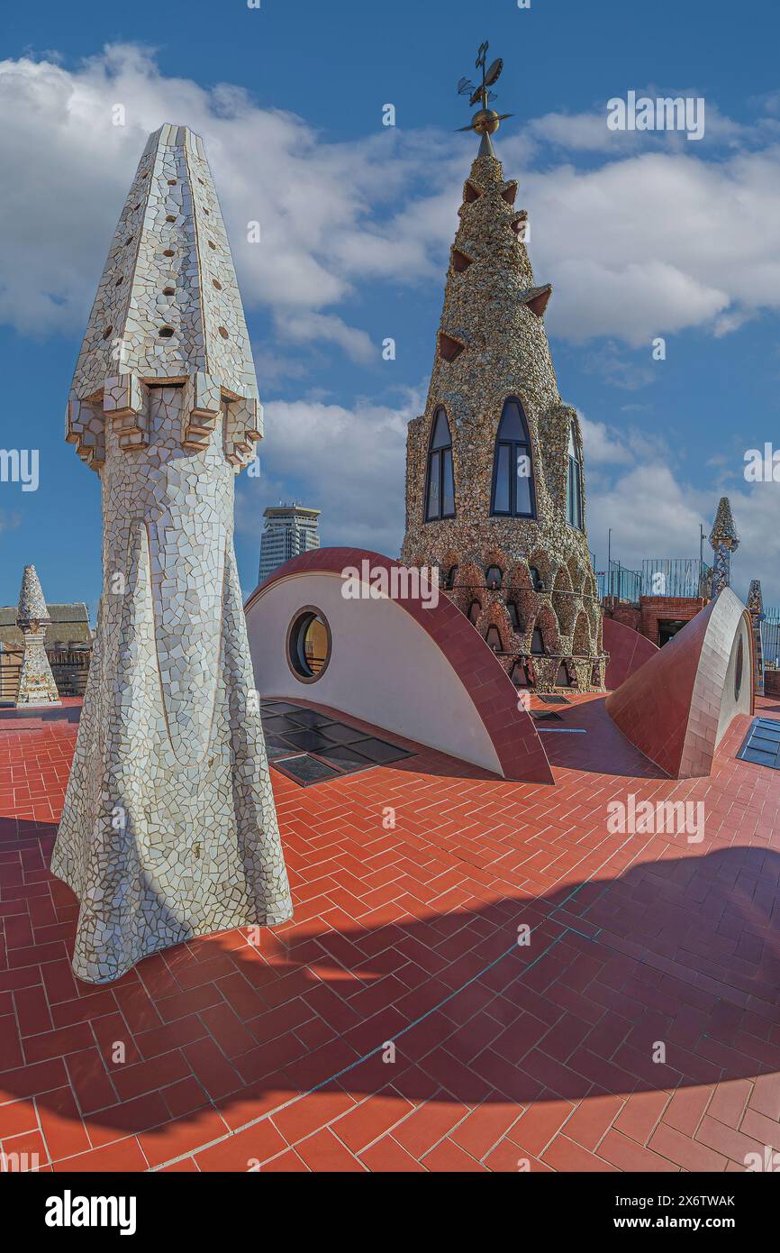 BARCELONA, SPAIN - APRIL 14, 2024: Original chimneys covered with ...