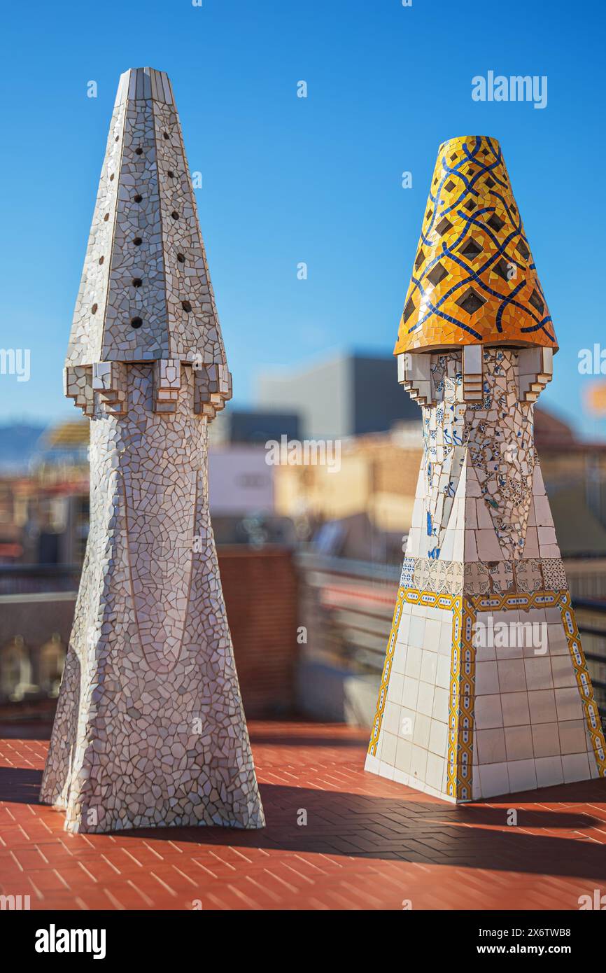 BARCELONA, SPAIN - APRIL 14, 2024: Original chimneys covered with ...