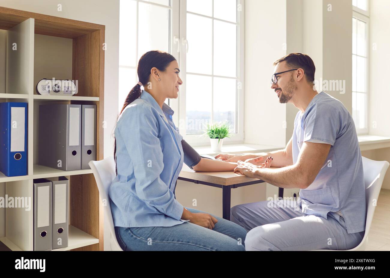Blood pressure monitoring woman hi-res stock photography and images - Alamy